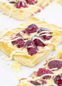 Raspberry Puff Pastry Tarts with Lemon Cream Cheese - SAVOR With Jennifer